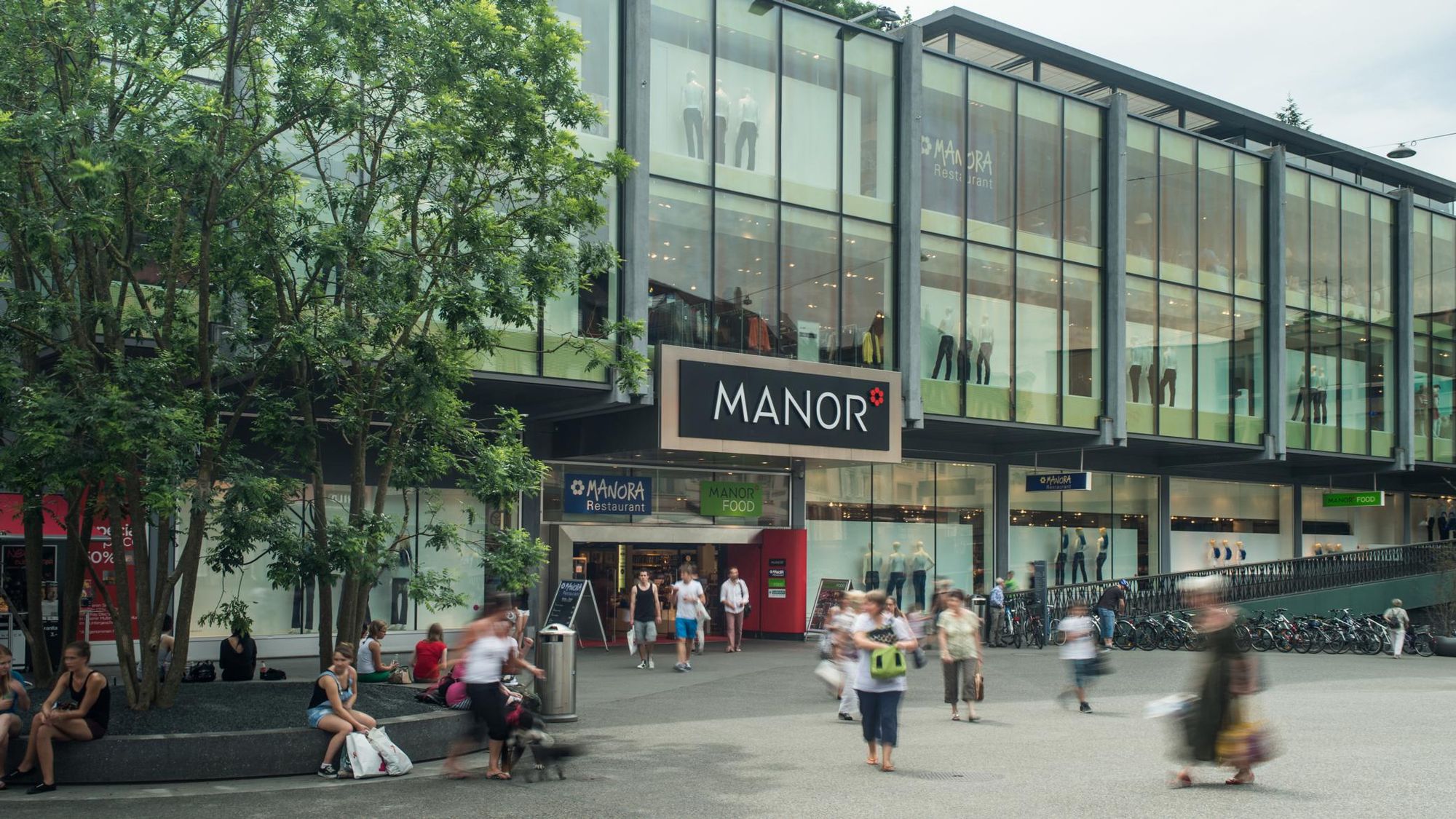 Manor restrukturiert und entlässt